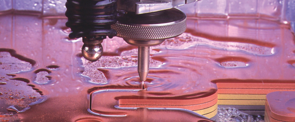 Precision in Layers: Exploring Waterjet Cutting for Stacked Materials